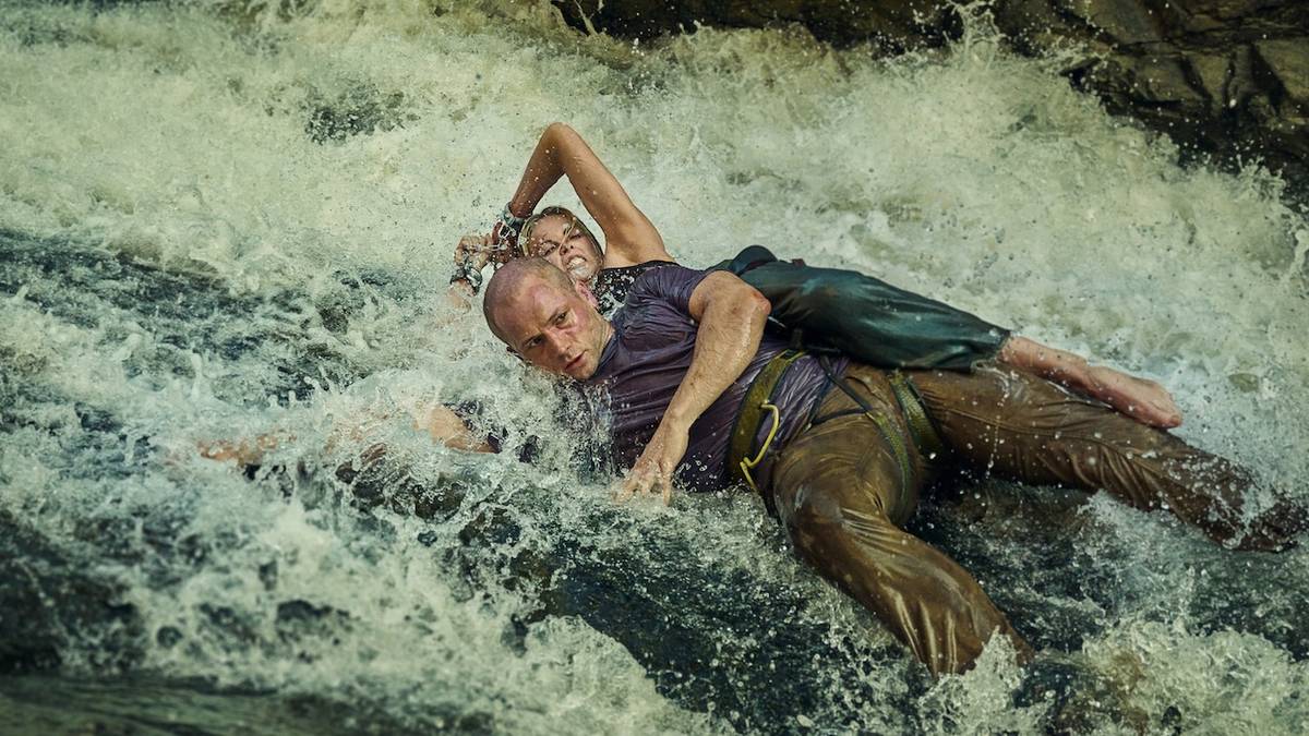 Charlize Theron Runs For Her Life From Taron Egerton in First 'APEX ...